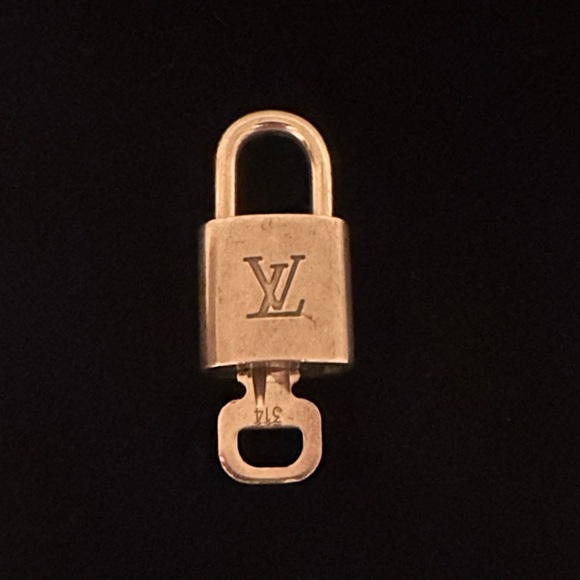 Louis Vuitton | Accessories | Louis Vuitton Luxurious Gold Lock And ...